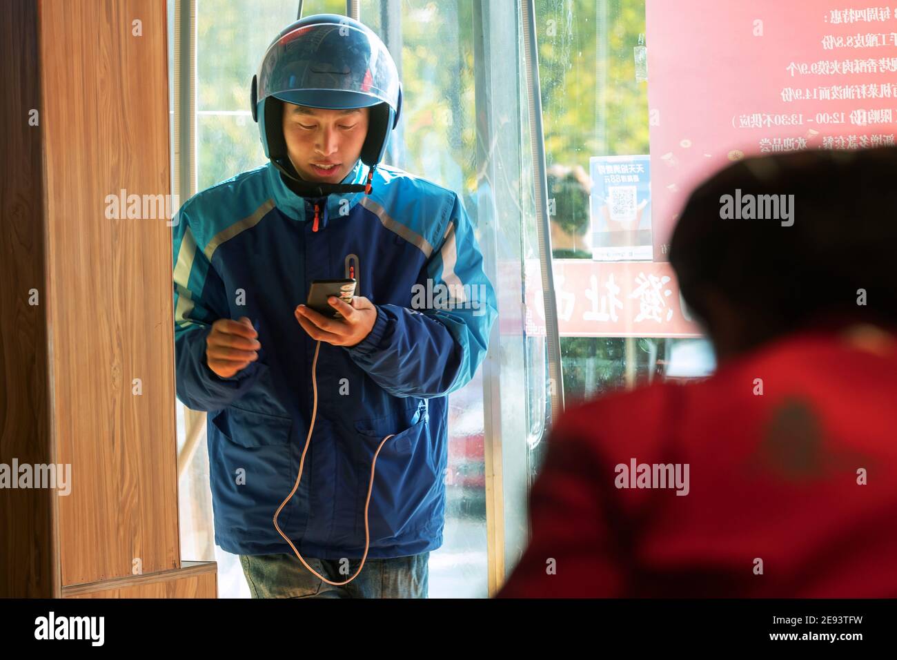 Take-out restaurant the door waiting to take food Stock Photo - Alamy