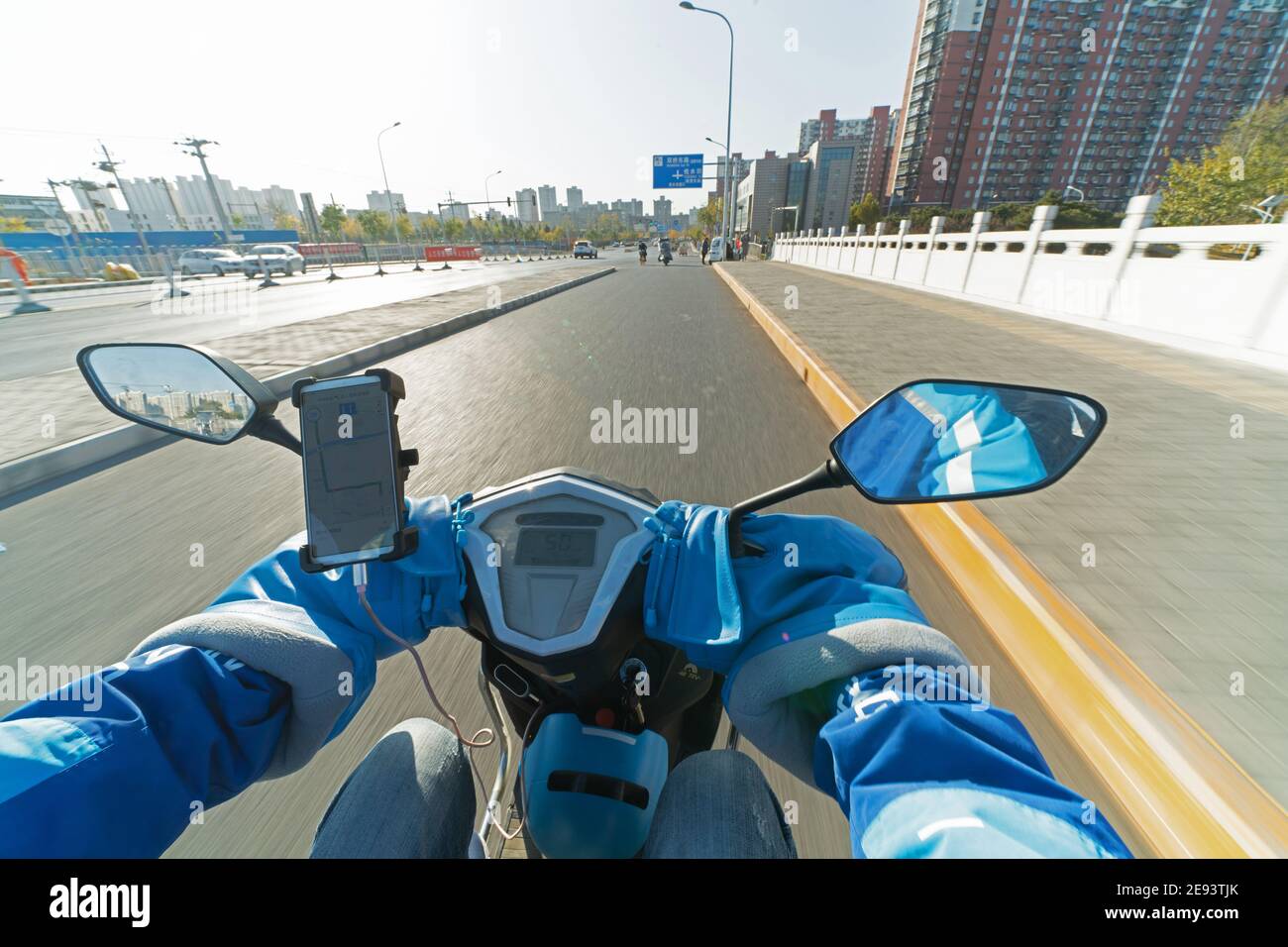 Using a mobile phone navigation dispatcher Stock Photo - Alamy