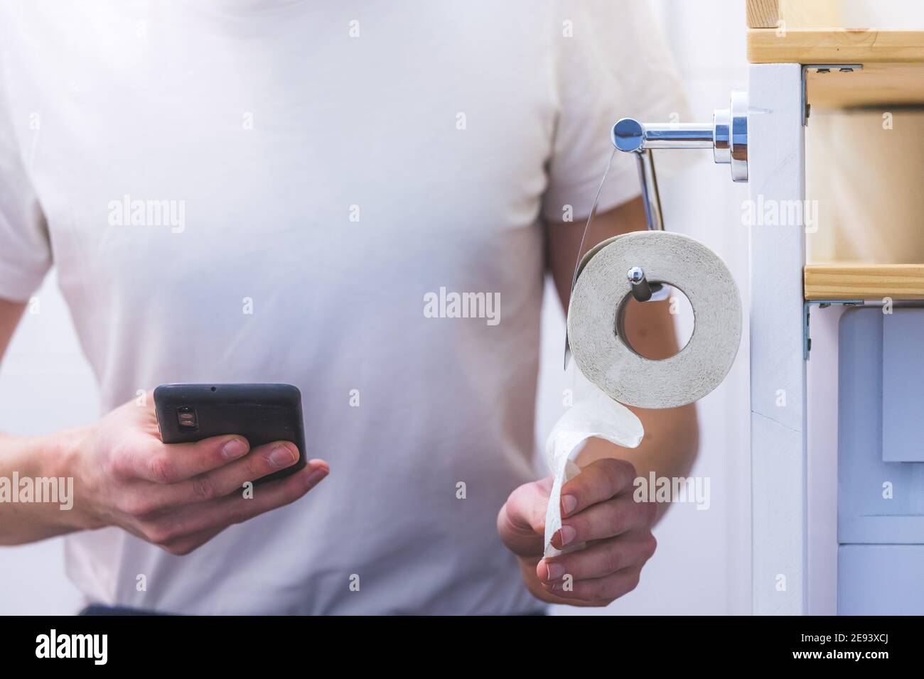 Hand young man using toilet hi-res stock photography and images - Alamy