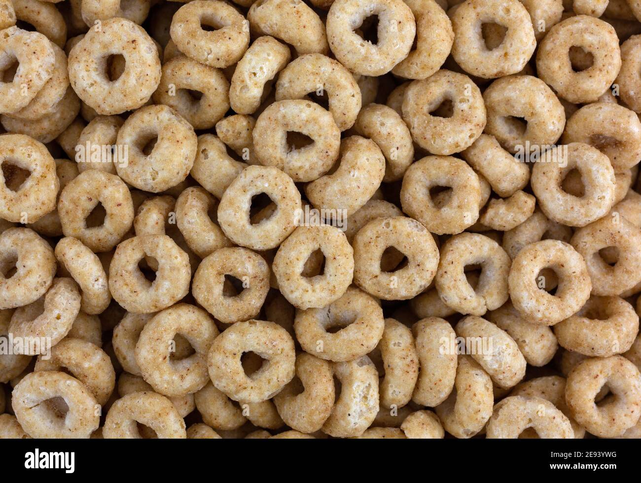 Close view of dry generic round whole grain oat cereal Stock Photo - Alamy
