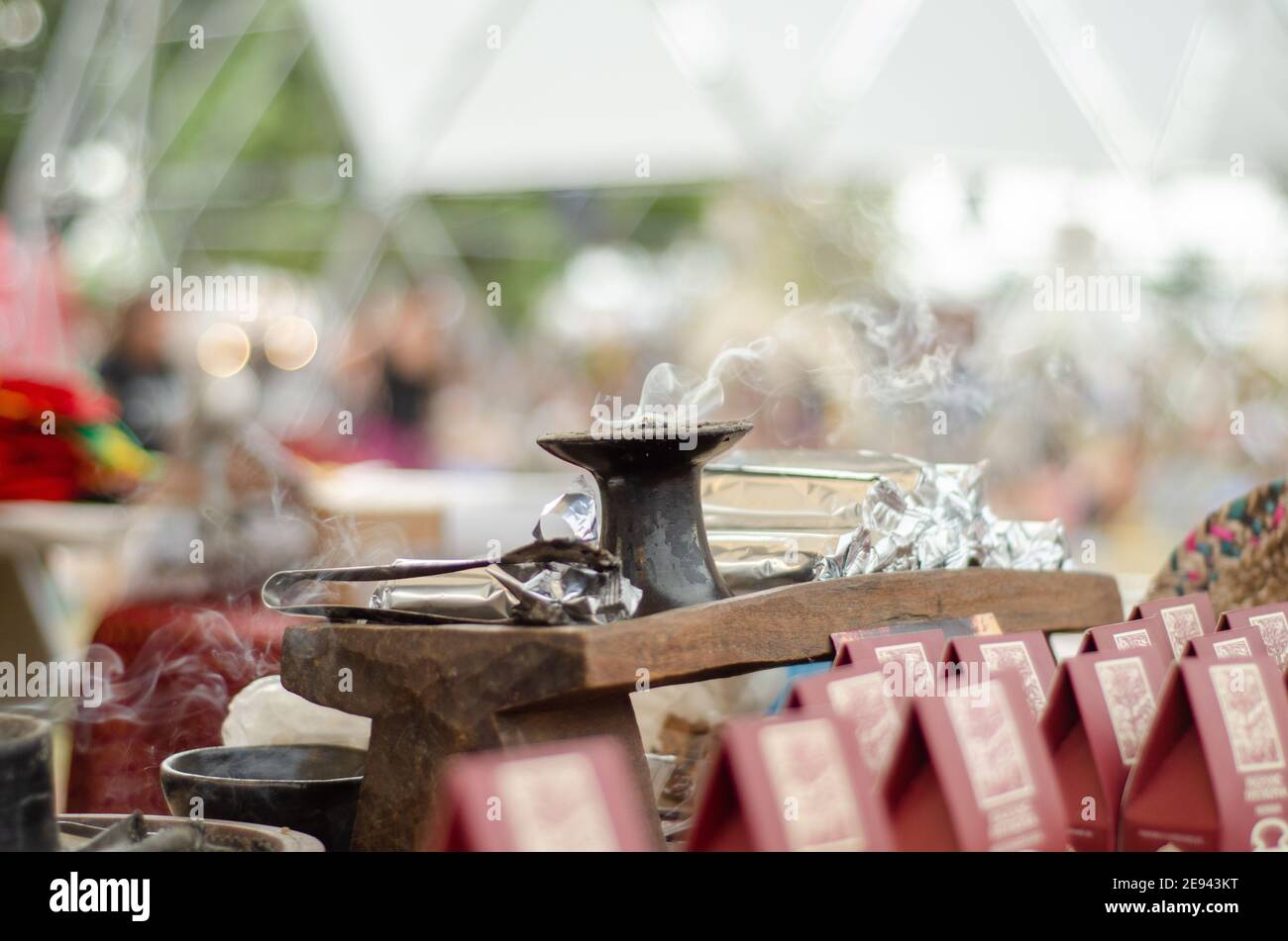 Selective focus of a smoking metal vessel at a flea market Stock Photo ...