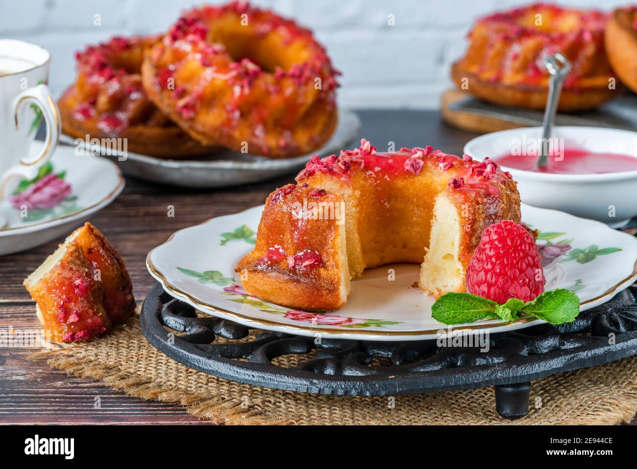 Mini vanilla pound cakes with raspberry icing Stock Photo - Alamy