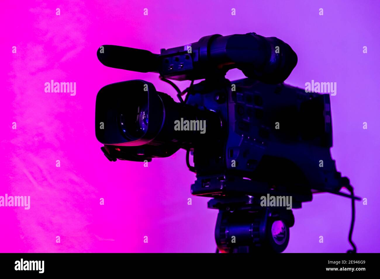 Silhouette of a videography camera with a colorful background Stock ...