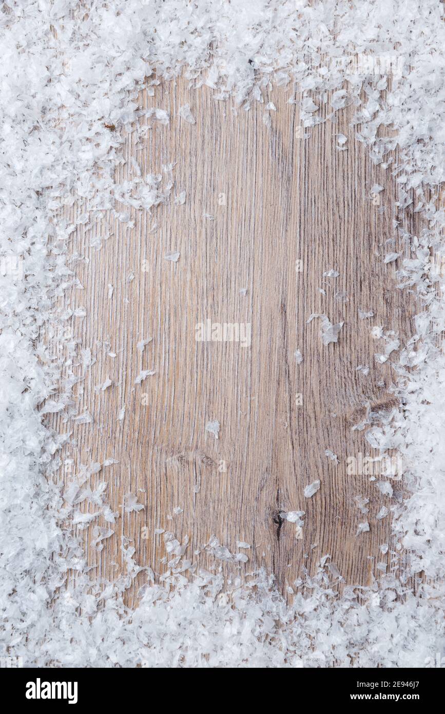 wooden background with snowy frame Stock Photo - Alamy