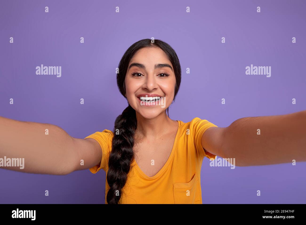 Indian woman taking a self portrait, point of view Stock Photo - Alamy