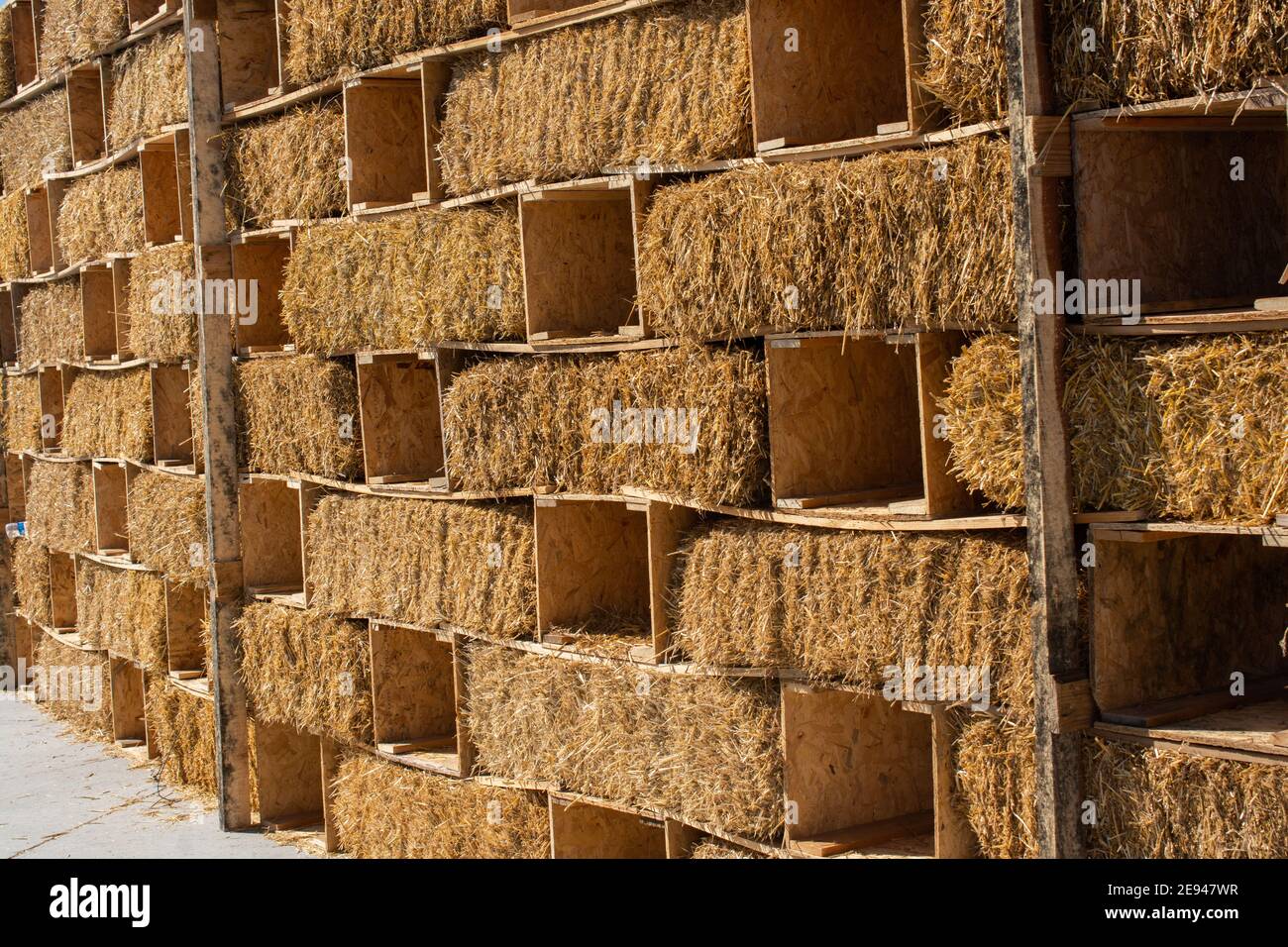 Square straw bales stacked in hi-res stock photography and images - Alamy