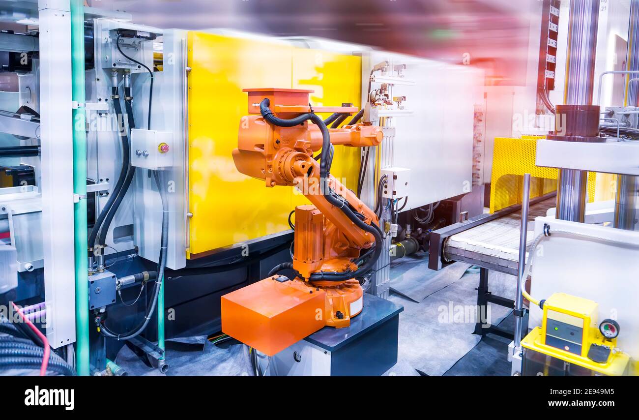 Automatic robot in a smart casting factory Stock Photo - Alamy
