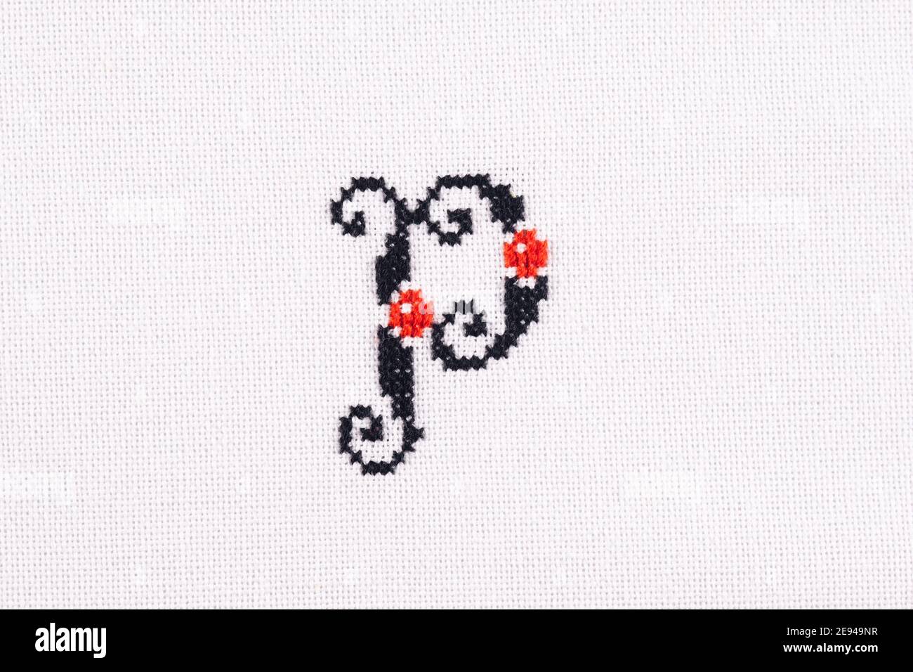 Letter P of Embroidered Cross - Stitch Latin Alphabet on White Linen ...