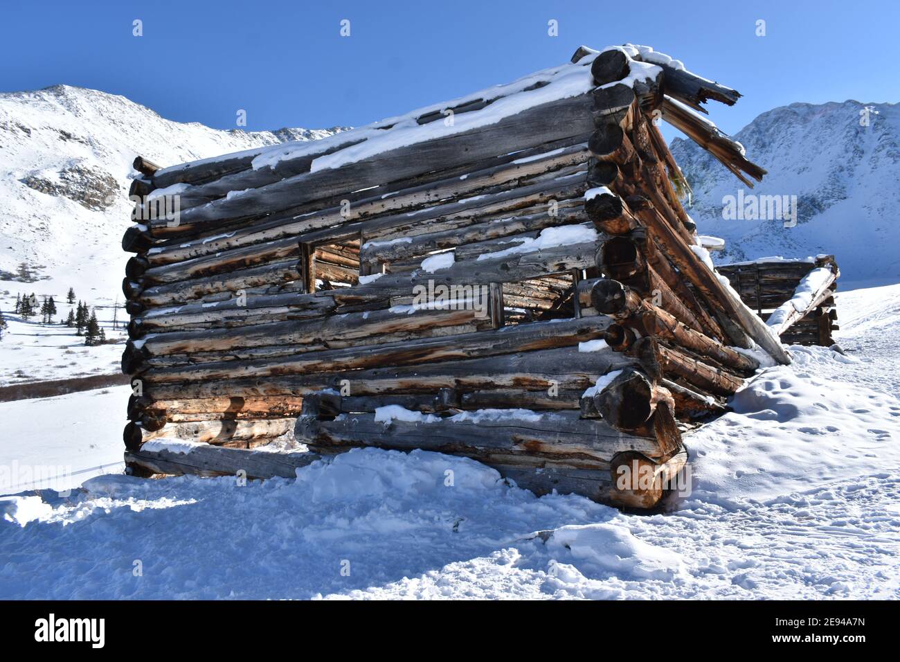 Rustic Mountain Home Beneath Peaks Stock Photo - Alamy
