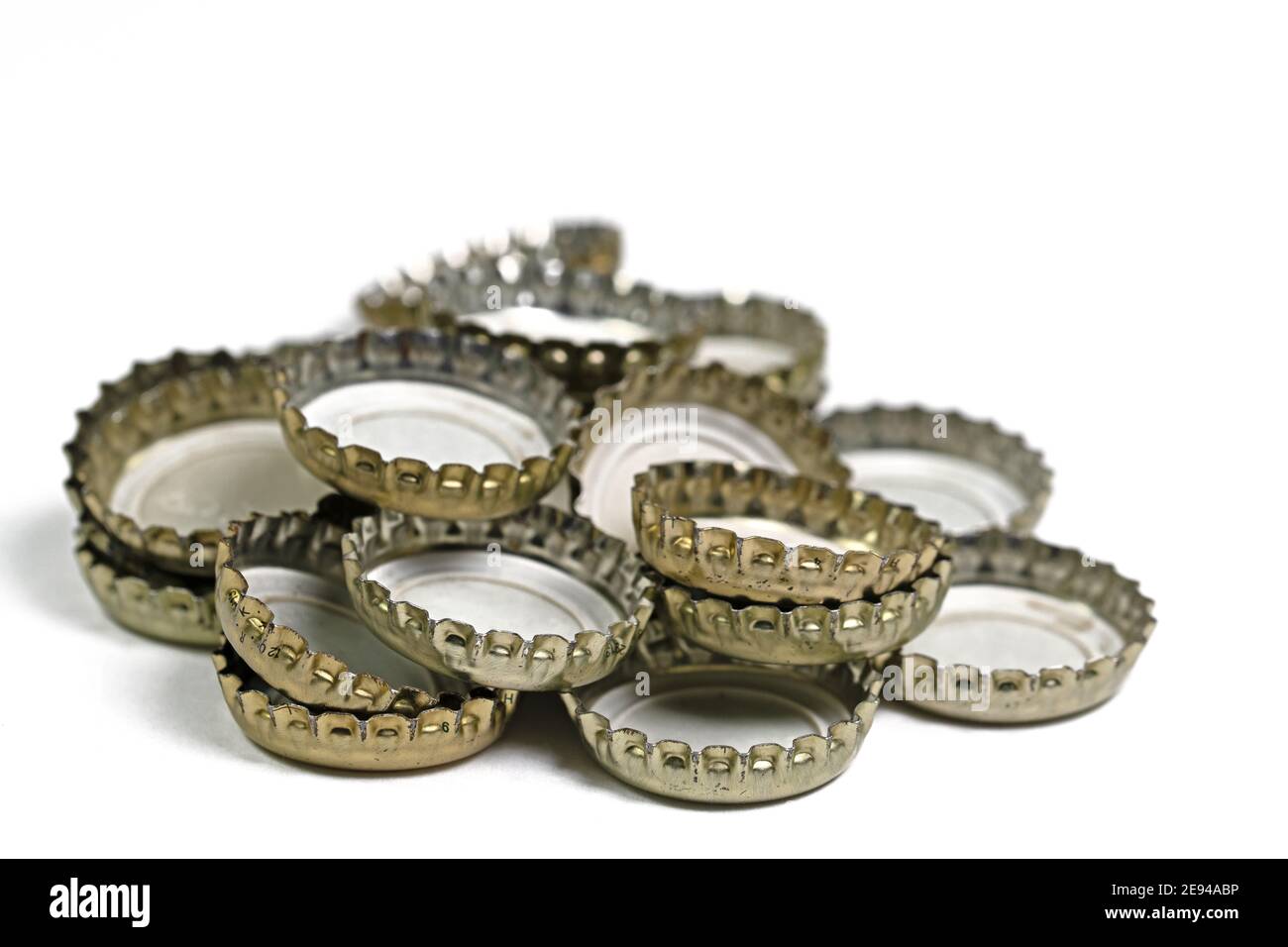 Crown cork isolated against a white background Stock Photo - Alamy