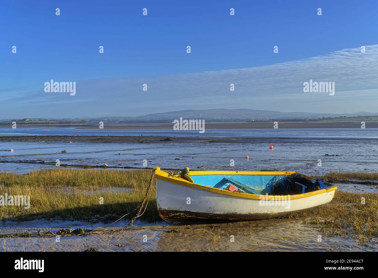 A beached yellow rowing boat at Sunderland Point Stock Photo - Alamy