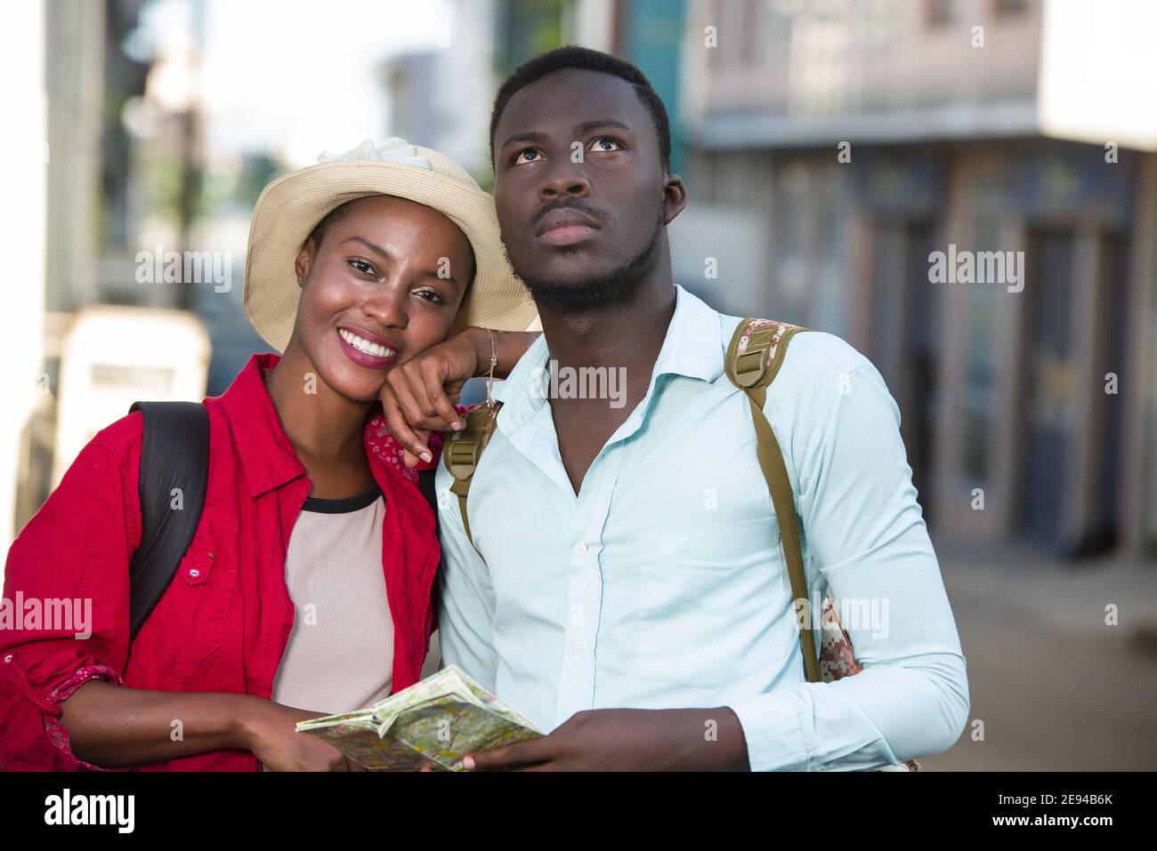 Young american tourists map hi-res stock photography and images - Alamy
