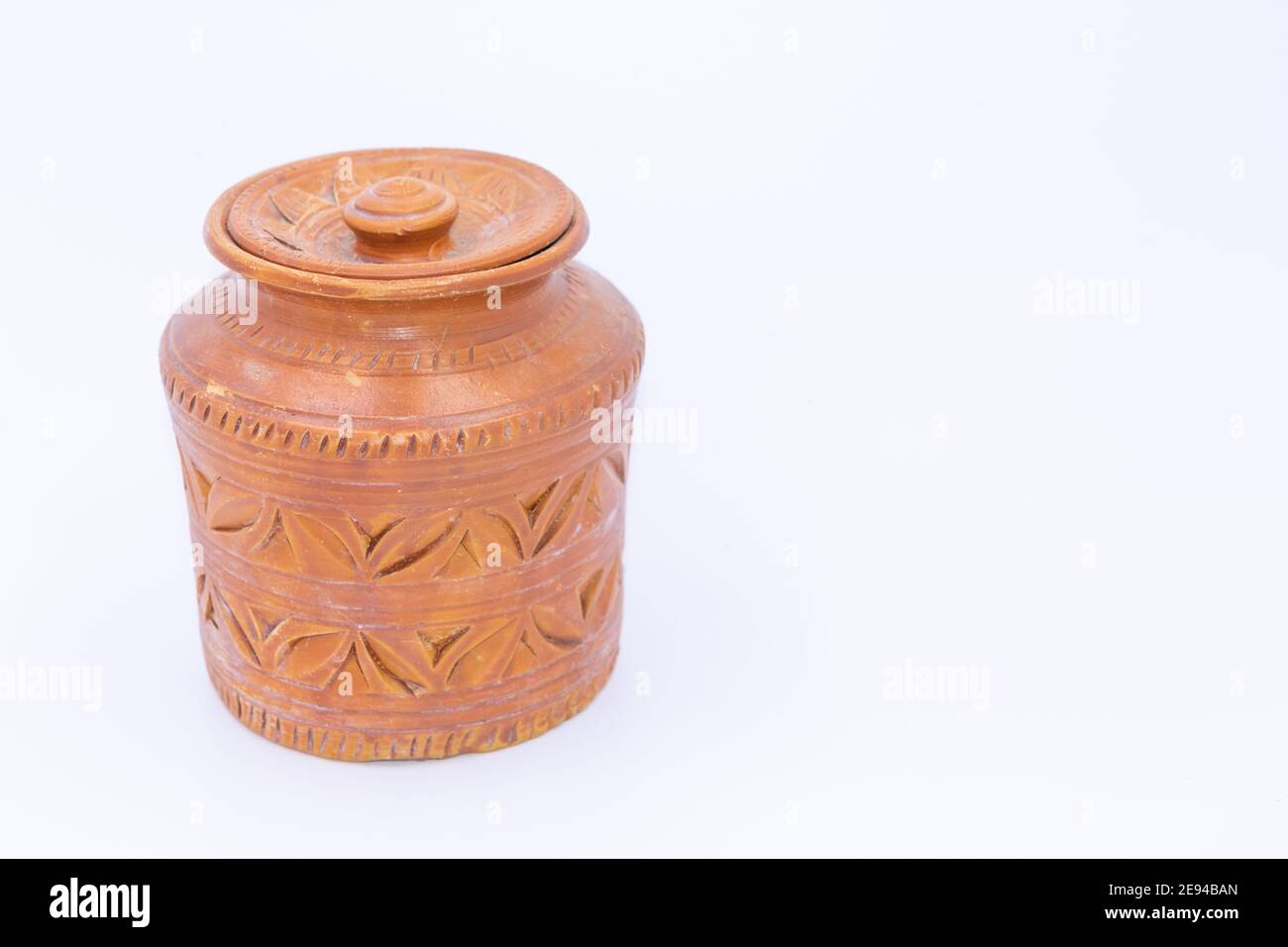 Close up of a jar made of clay with designs and patterns on it Stock ...