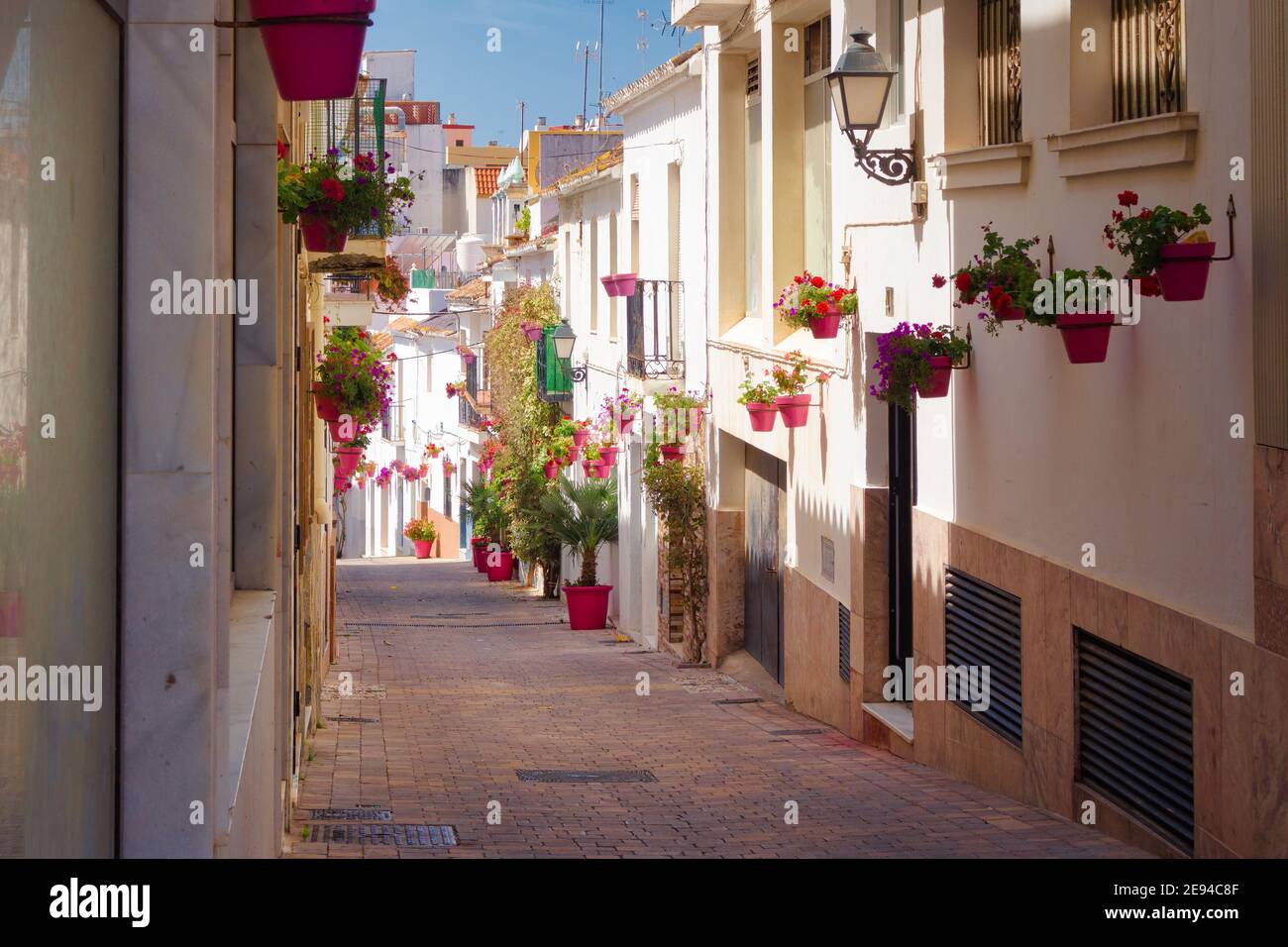 View of one of the typical narrow streets of the historic center of ...