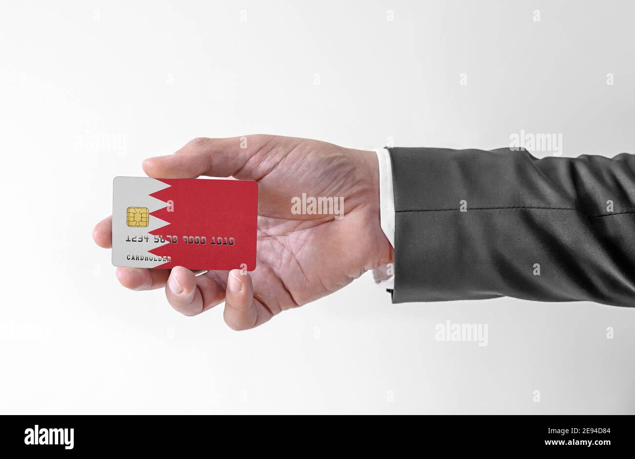 Bahrain flag in hand hi-res stock photography and images - Alamy