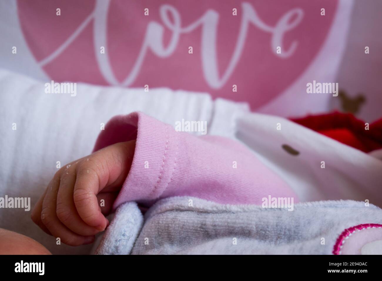 Newborn baby girl hand hi-res stock photography and images - Alamy