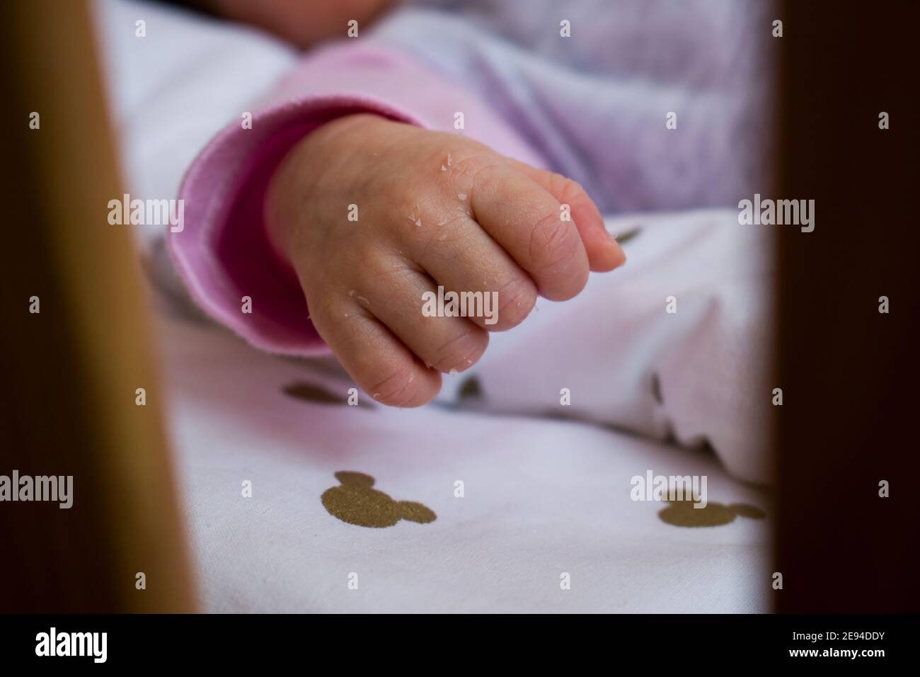 New born baby hand in the cradle, cot Stock Photo - Alamy