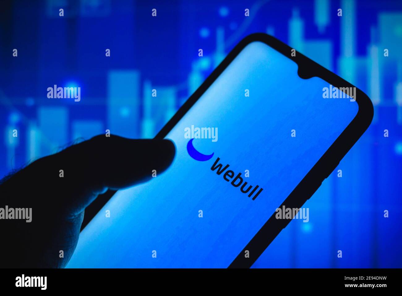 In this photo illustration the Webull Financial, logo seen displayed on ...