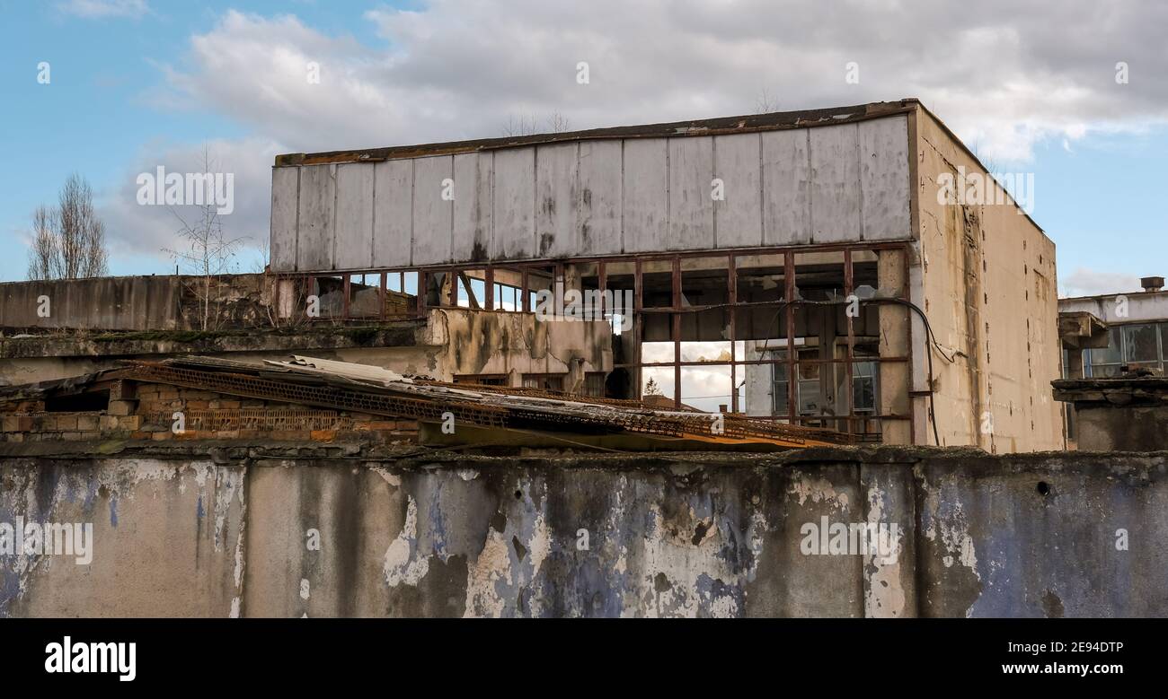 abandoned factory warehouse with broken windows Stock Photo - Alamy