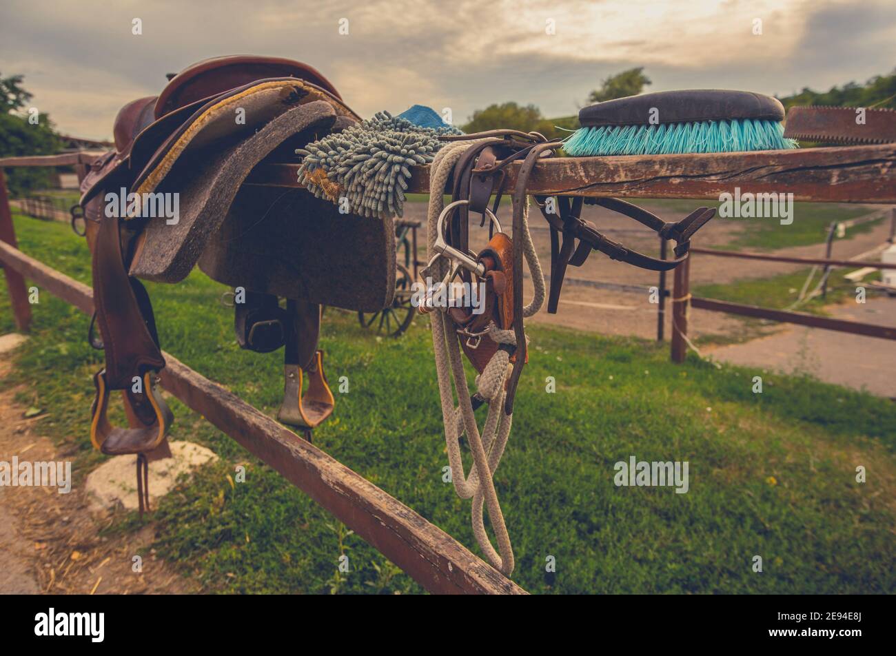 Equestrian Facility Horse Accessories on the Wooden Field Fence. Horse ...