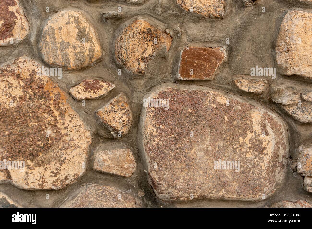 Cobblestone masonry, close-up stone wall, stone background, cobblestone ...