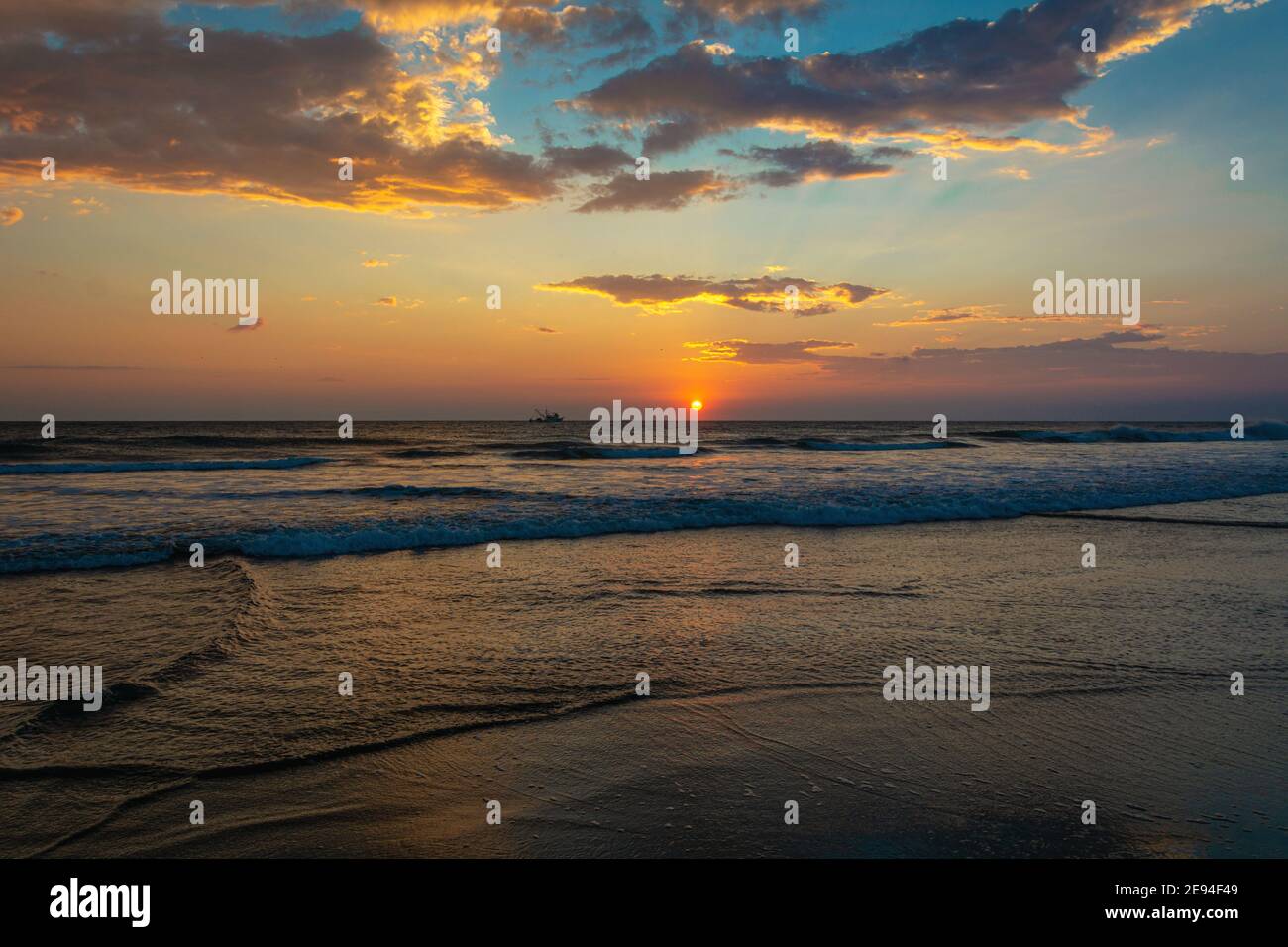 Sunset in a mexican beach Stock Photo - Alamy