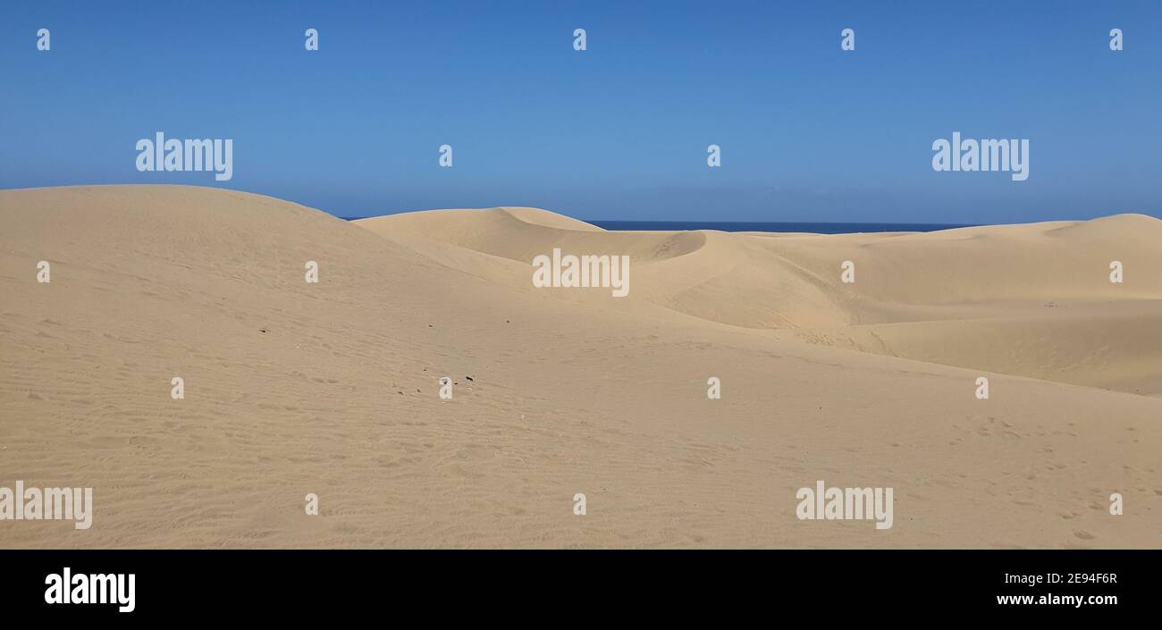 Beautiful blue sky over a desert Stock Photo - Alamy