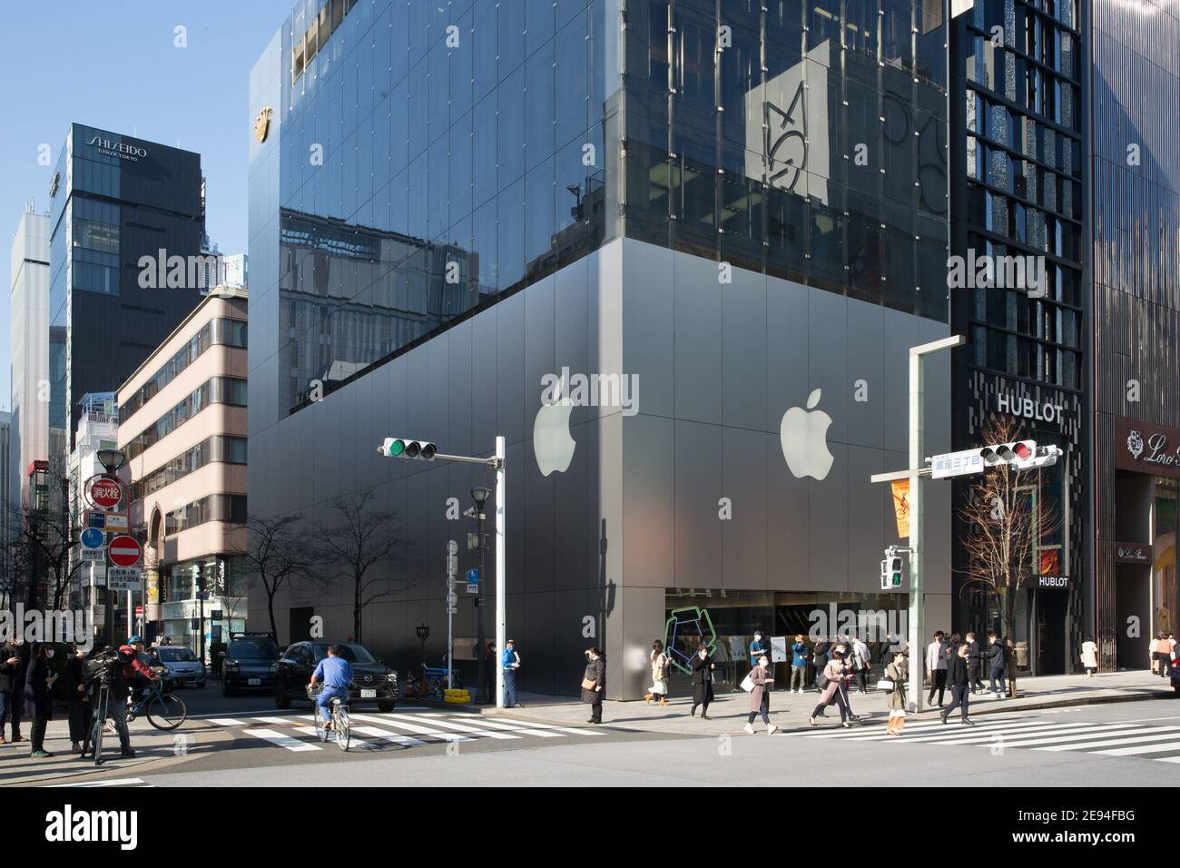 American multinational technology company Apple logo and store seen in ...