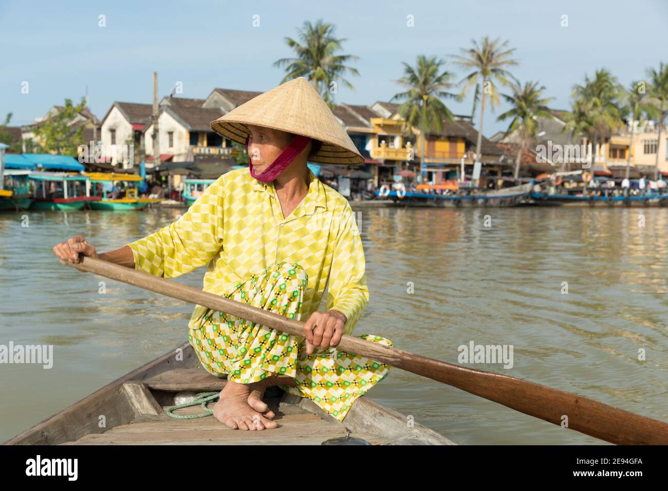 Vietnam Hoi An Old woman rowing canoe Stock Photo - Alamy