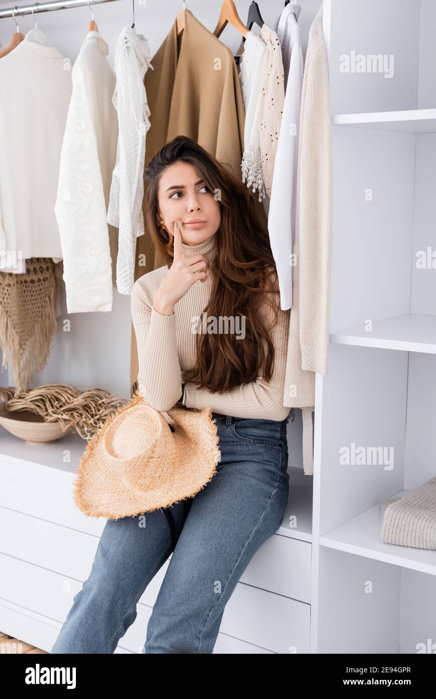 Wardrobe woman sitting hi-res stock photography and images - Alamy