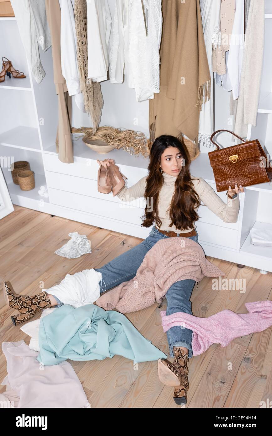 Woman sitting floor clothes wardrobe hi-res stock photography and ...