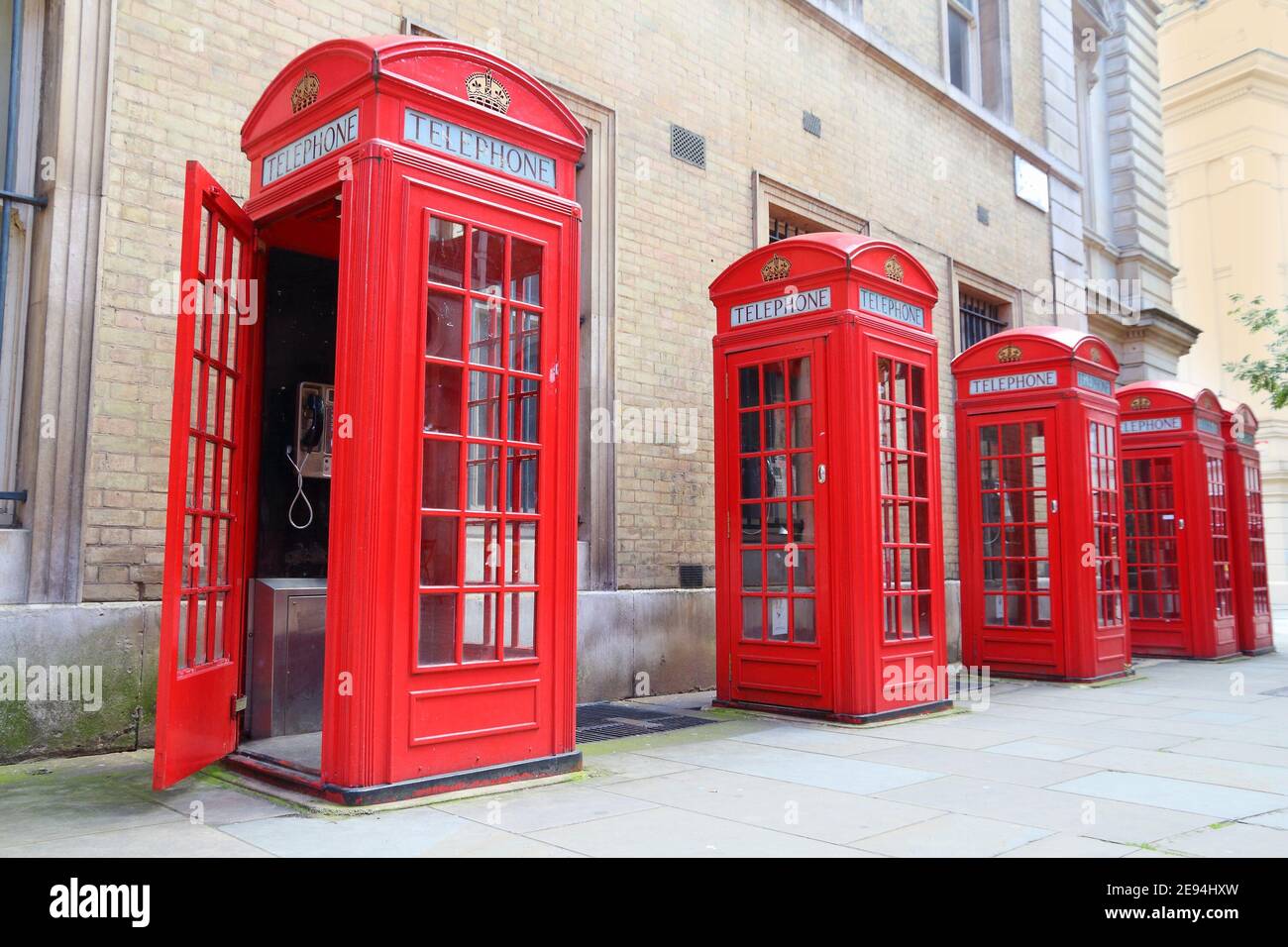 London telephone box row. London landmarks - red phone booth Stock ...