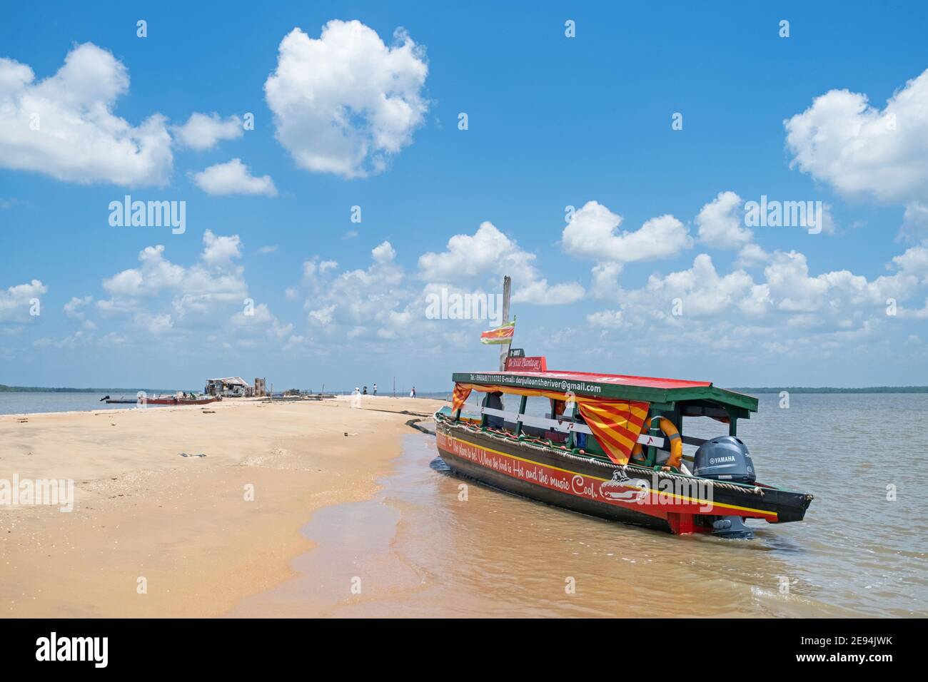 Wooden tourist boat / sightseeing boat beached on Braamspunt, sandbar ...