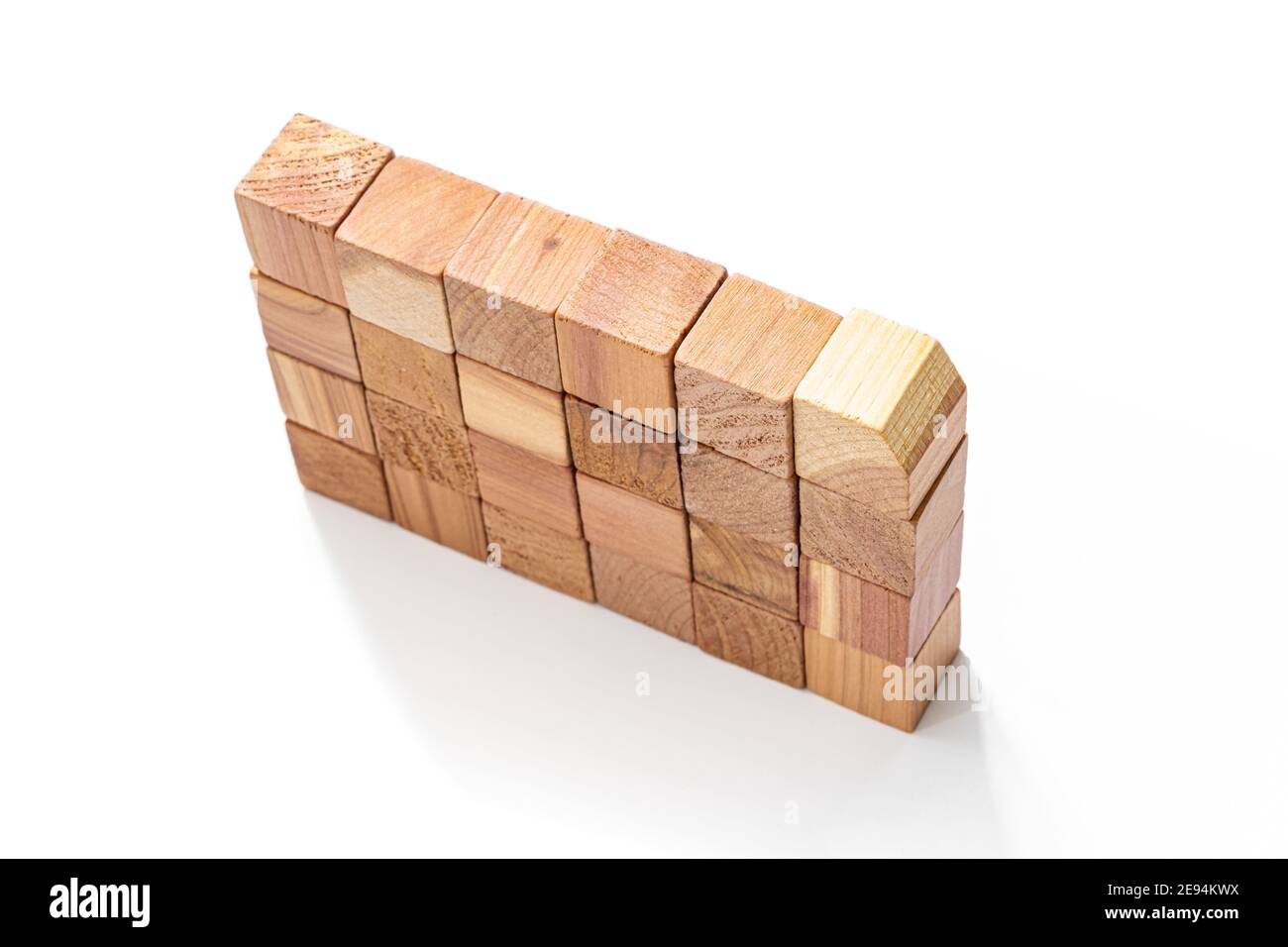 Wooden toy cubes in row Stock Photo - Alamy