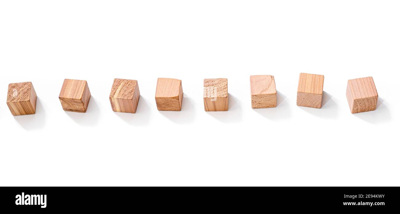 Wooden cubes in row isolated on white Stock Photo - Alamy
