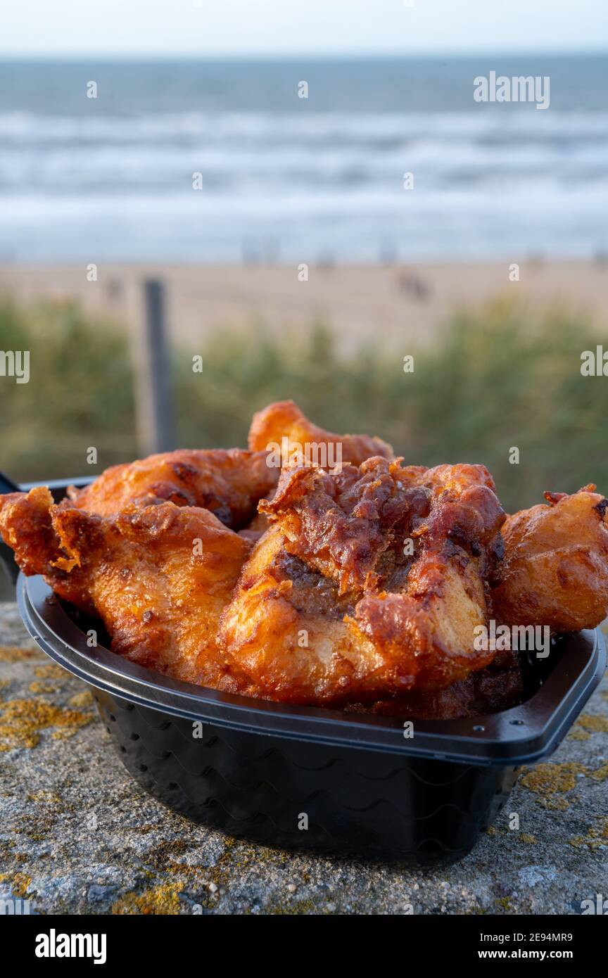 Dutch street seafood, deep fried cod fish fillet with garlic sauce ...