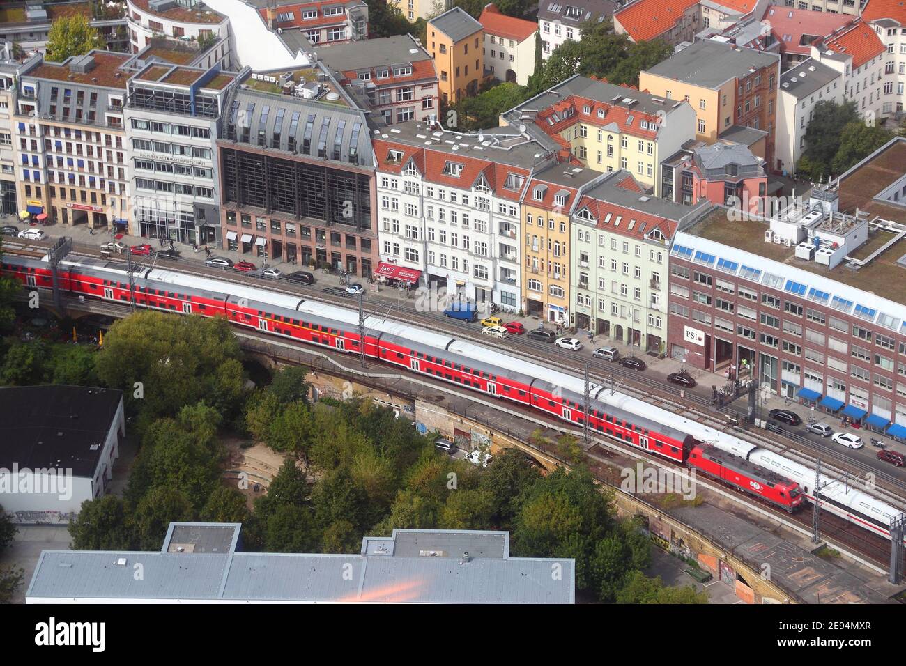 BERLIN, GERMANY - AUGUST 26, 2014: People ride red Deutsche Bahn train ...