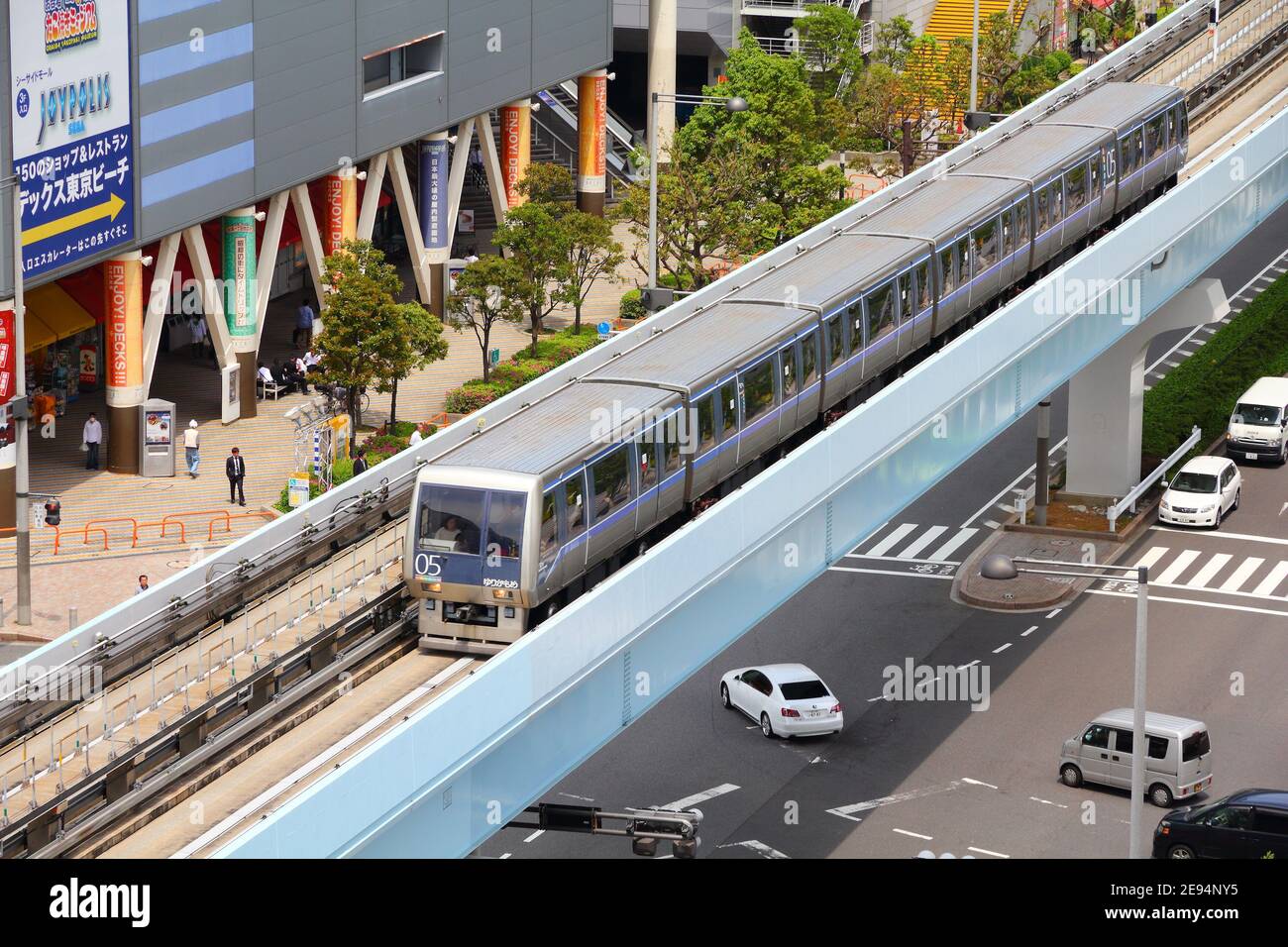 TOKYO, JAPAN - MAY 11, 2012: Elevated automated monorail train known as Yurikamome New Transit ...