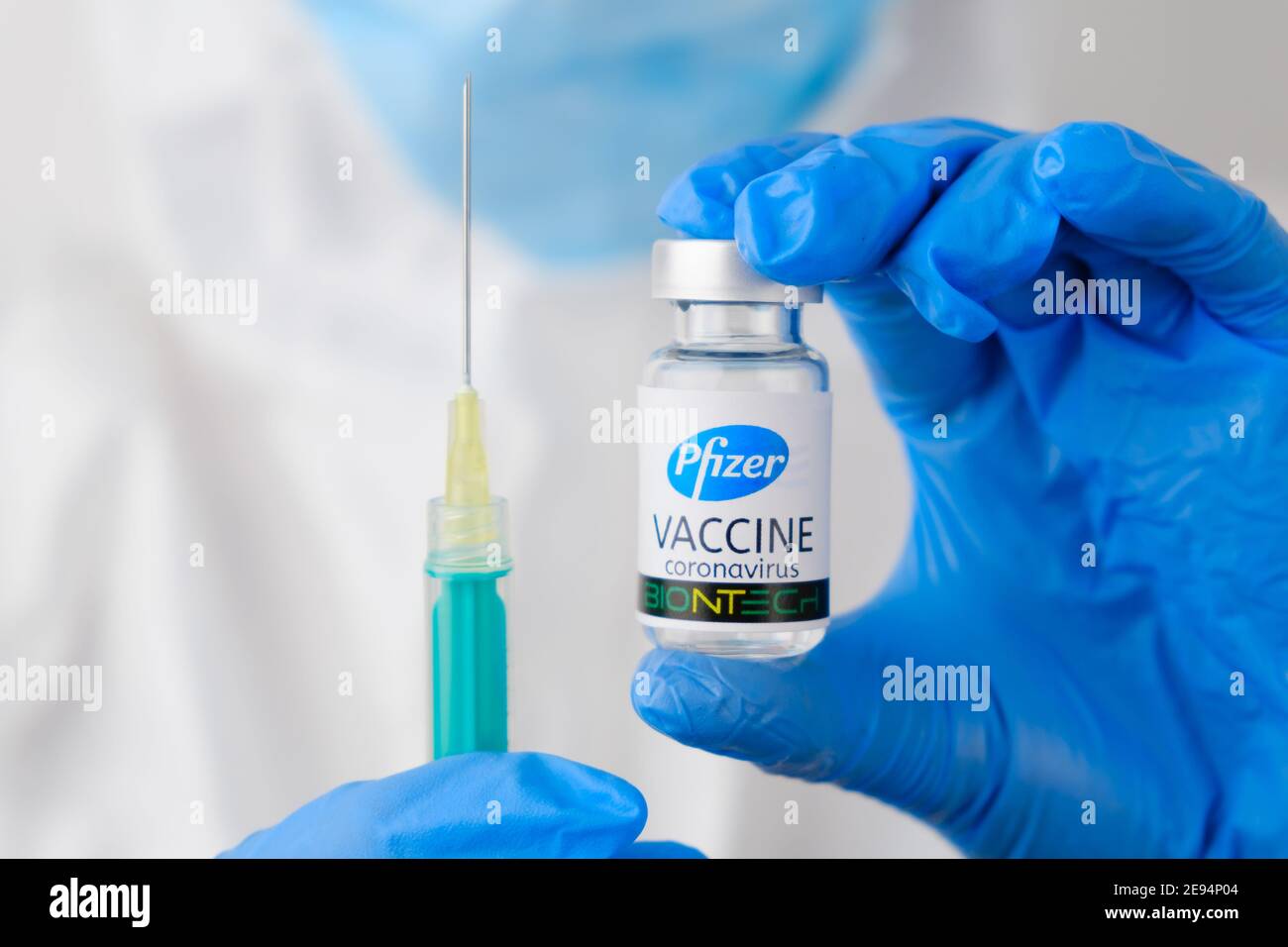 Pfizer and Biontech vaccine and disposable syringe for injection in ...