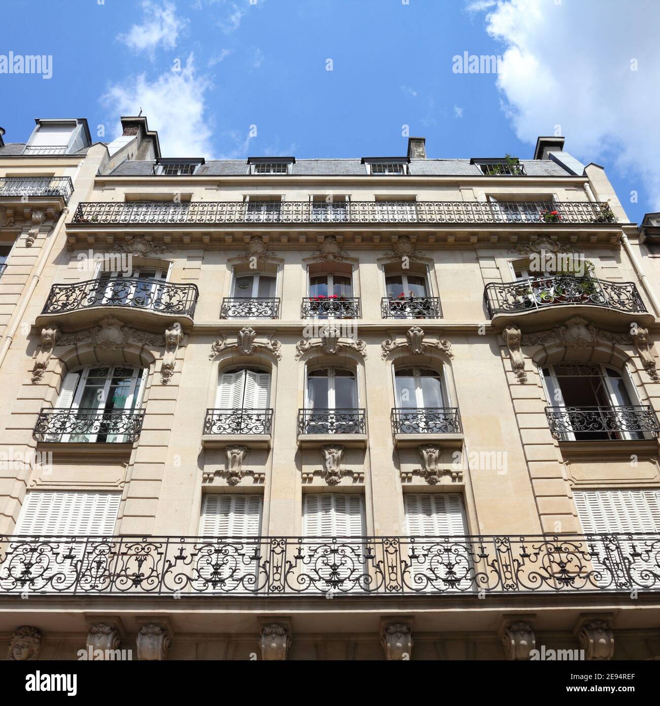 Paris, France - typical old apartment building. Windows and balconies ...