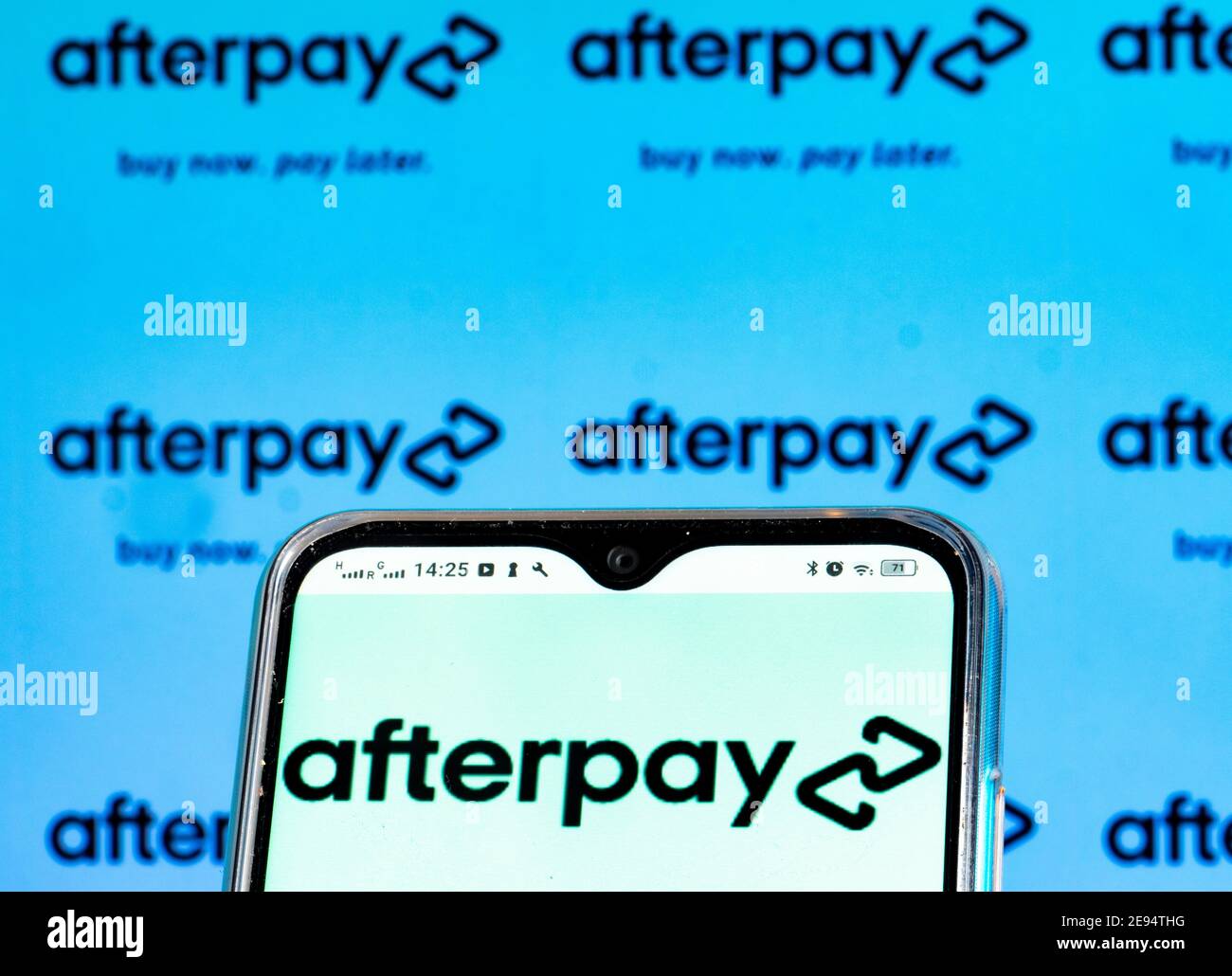 In this photo illustration, an Afterpay logo seen displayed on a ...