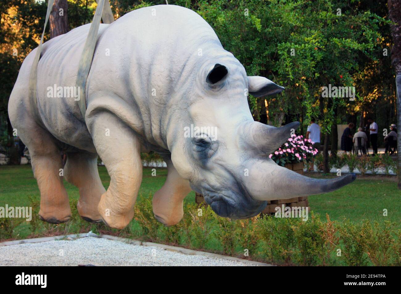 statue of a fake rhino raised in a green park in tuscany Stock Photo ...