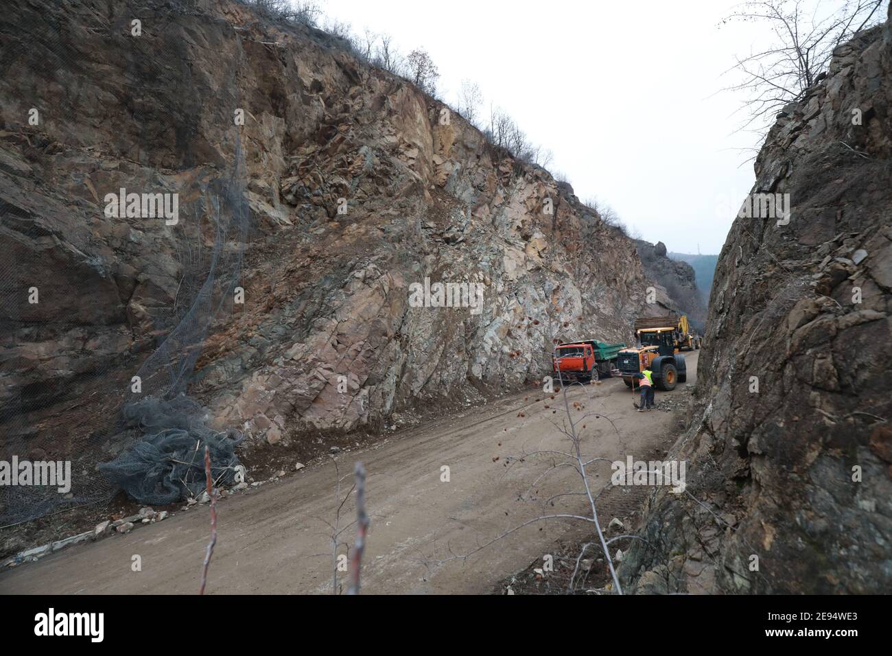 Heavy chain and wheeled equipment clears the highway after a rock ...