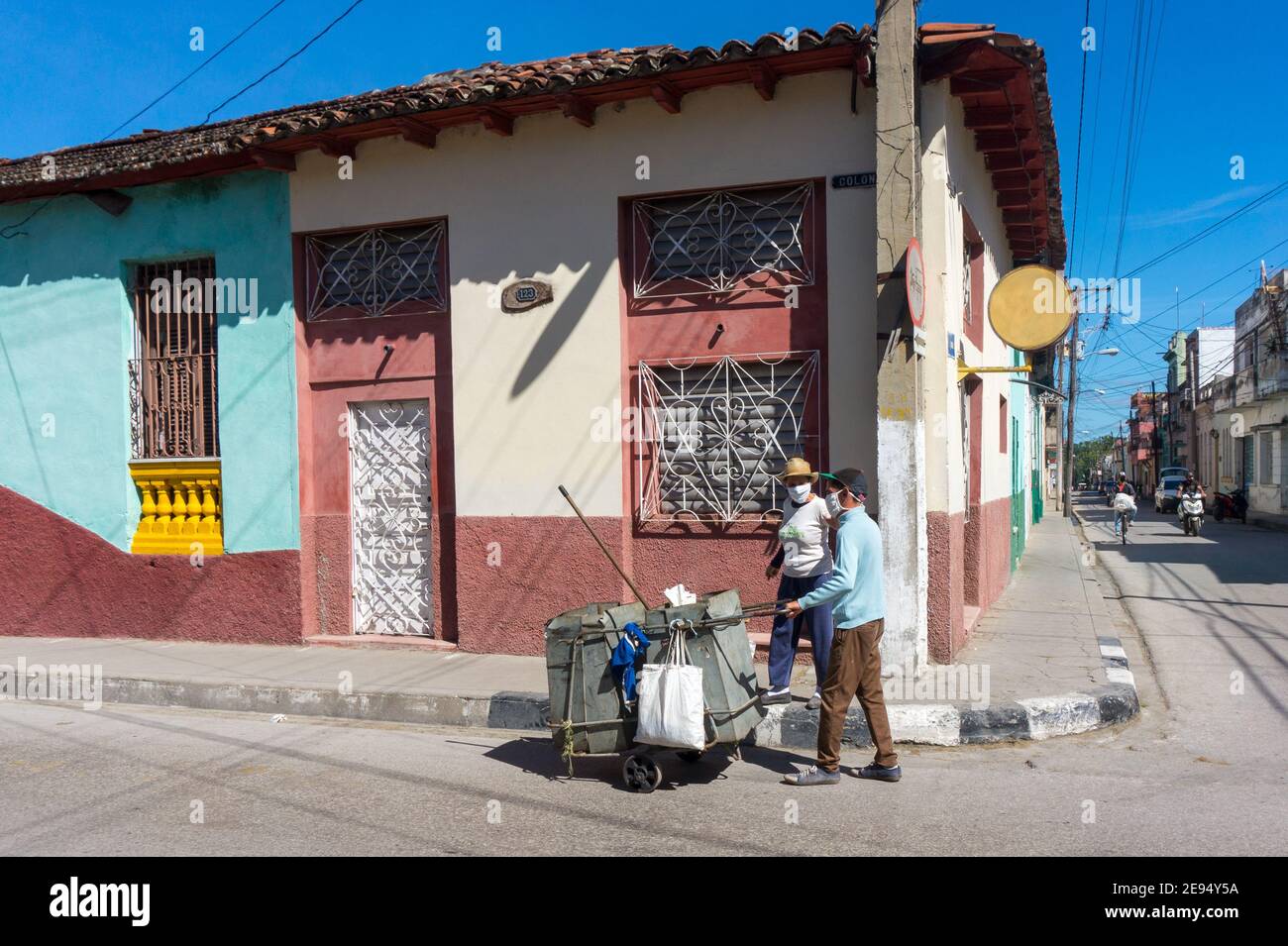 Cuban young people working as street sweepers in Santa Clara, Cuba ...
