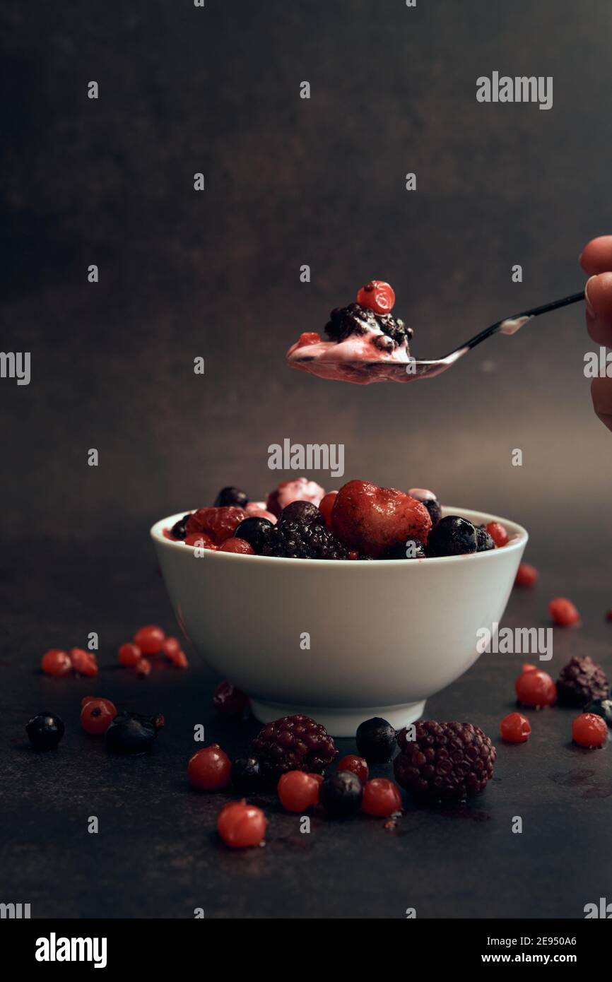 natural yogurt and red berries Stock Photo - Alamy