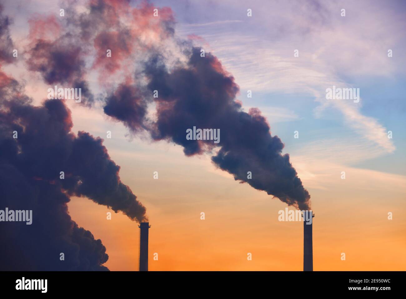 A photo of a factory in Europe, taken in the morning lit by the rising ...
