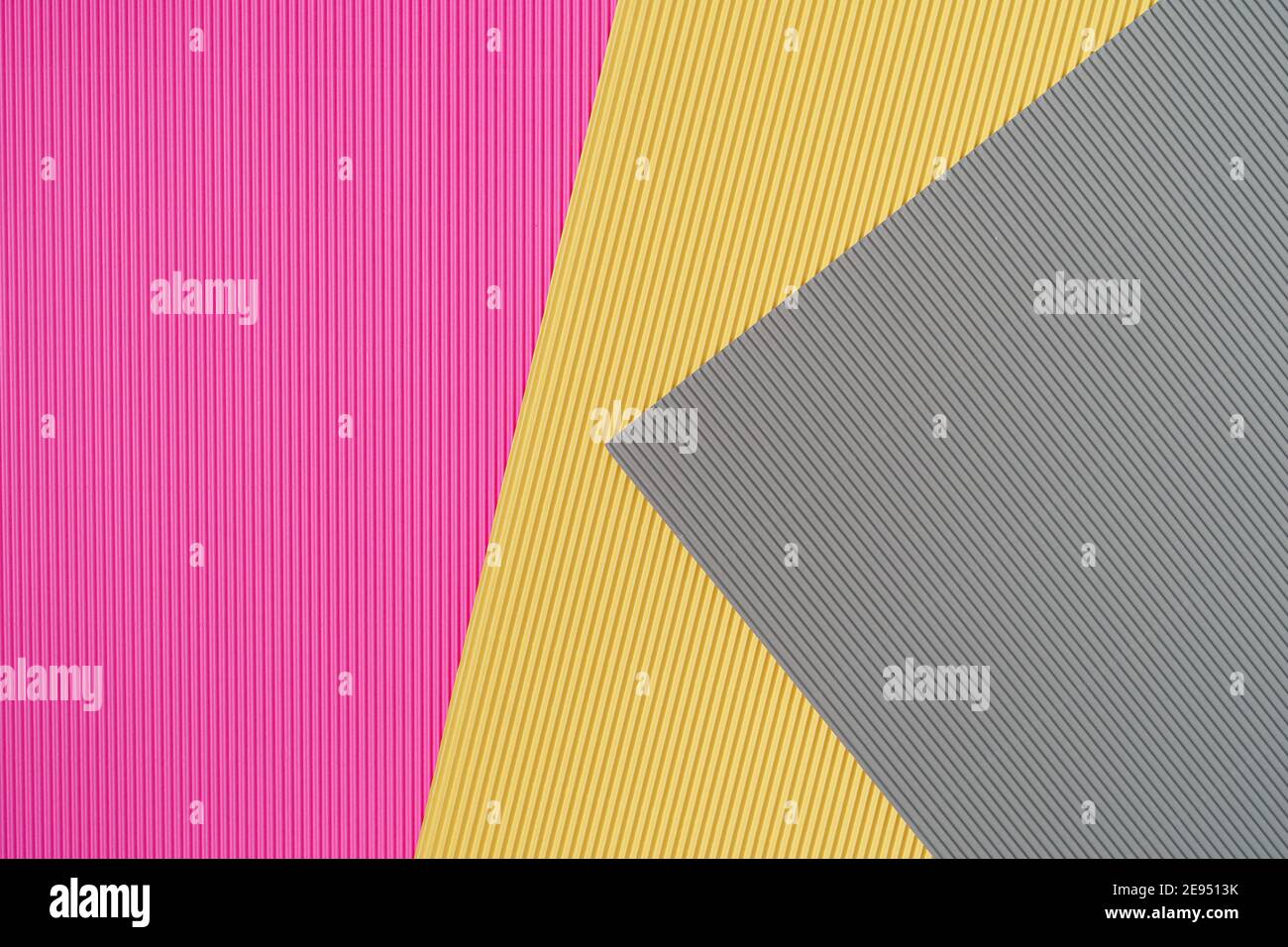 Gray, pink and yellow three tone color paper background with stripes ...