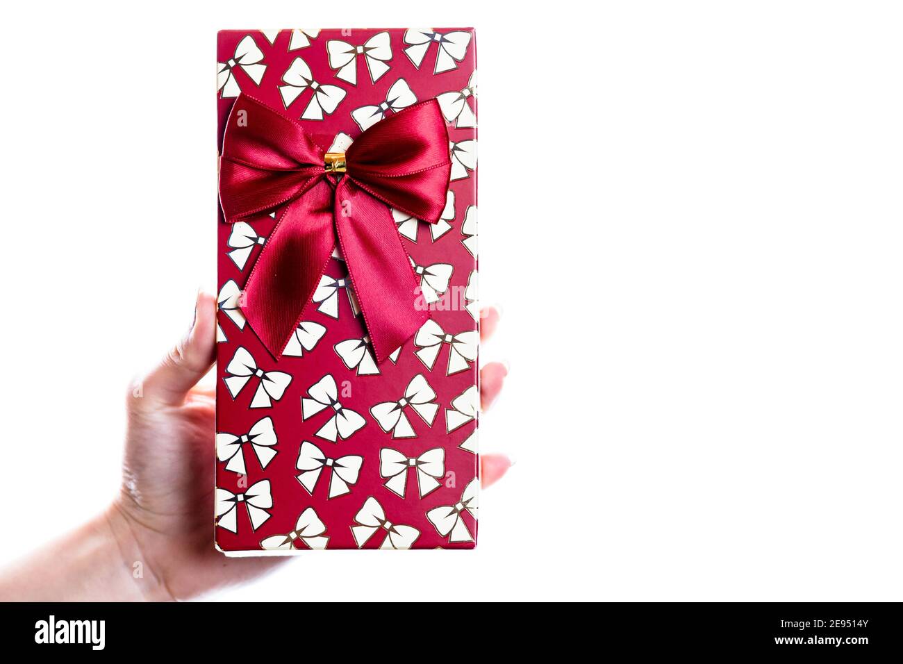 Hand showing holding giving or receiving gift present box isolated on ...