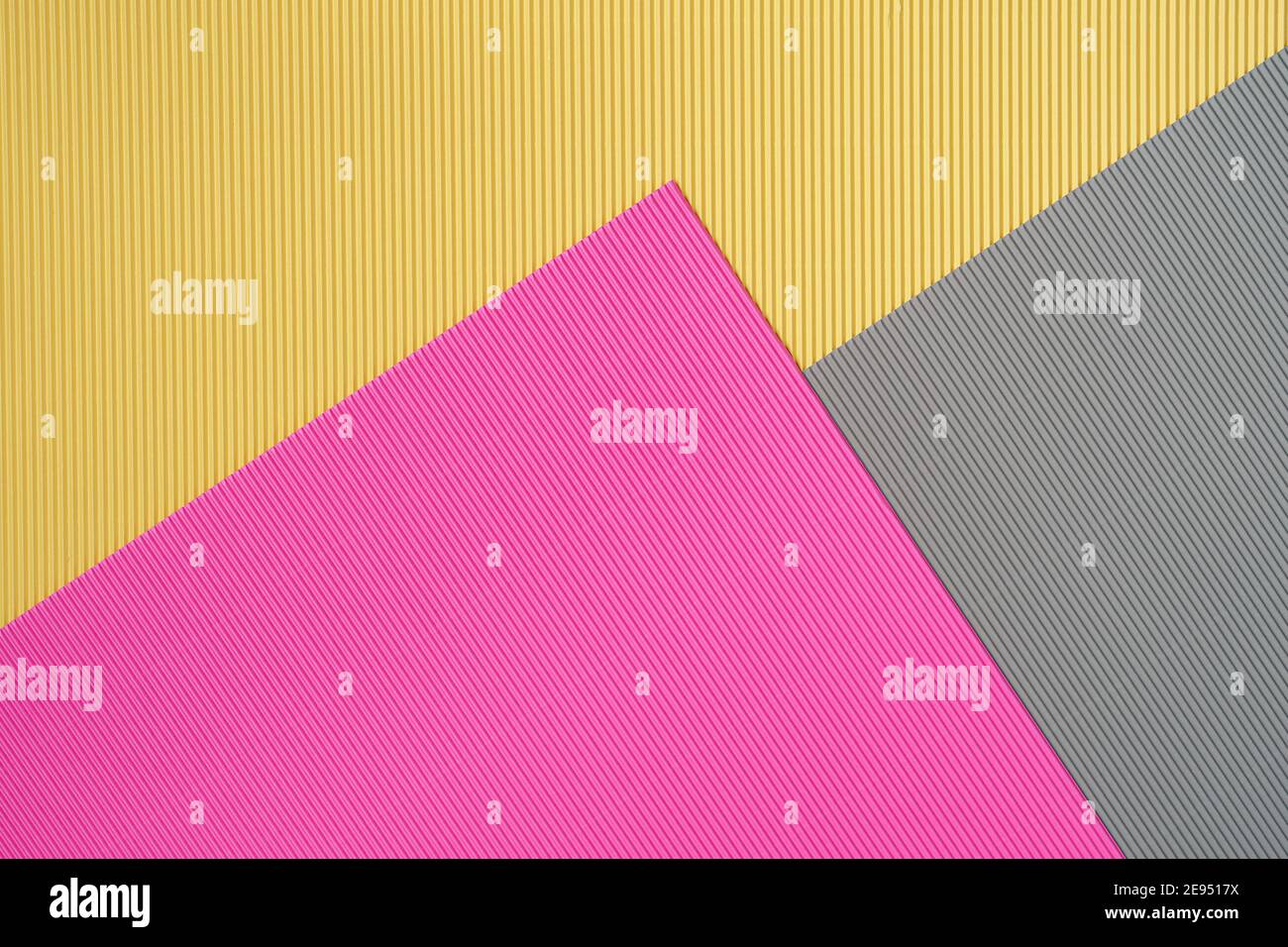 Gray, pink and yellow three tone color paper background with stripes ...