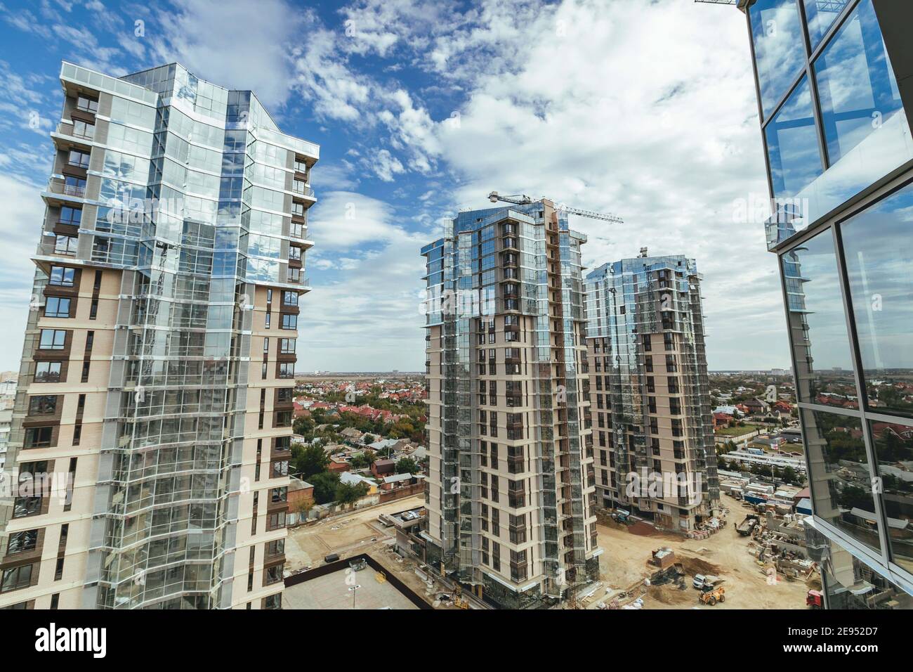 luxury residential high-rise buildings with mirrored glazing are under ...